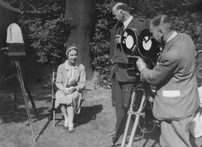 Image of F Percy Smith, English filmmaking pioneer, filming in a pond,