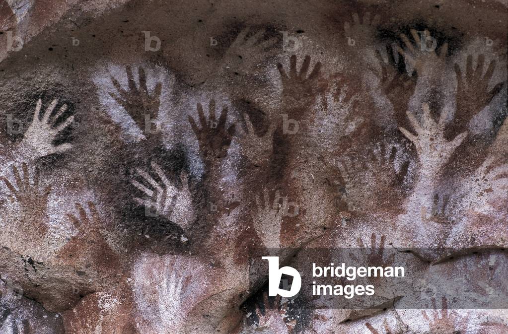 Image of Prehistoric art : cave with hand prints 'Cave of the by ...
