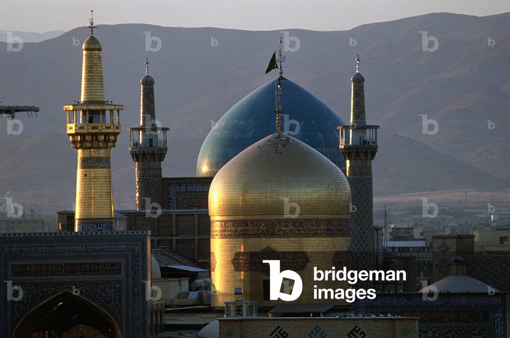 Image of The all-gold dome and minaret of the shrine of Imam by Islamic ...