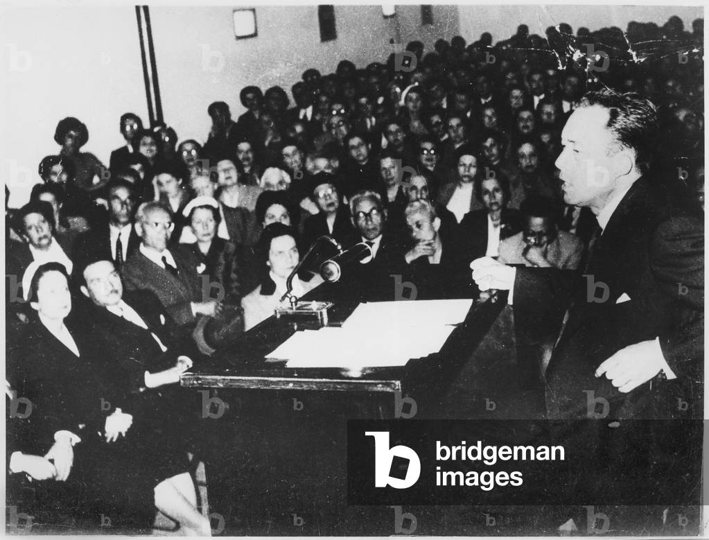 Image of Albert Camus (1913-60) making a speech in rue Recamier, Paris ...