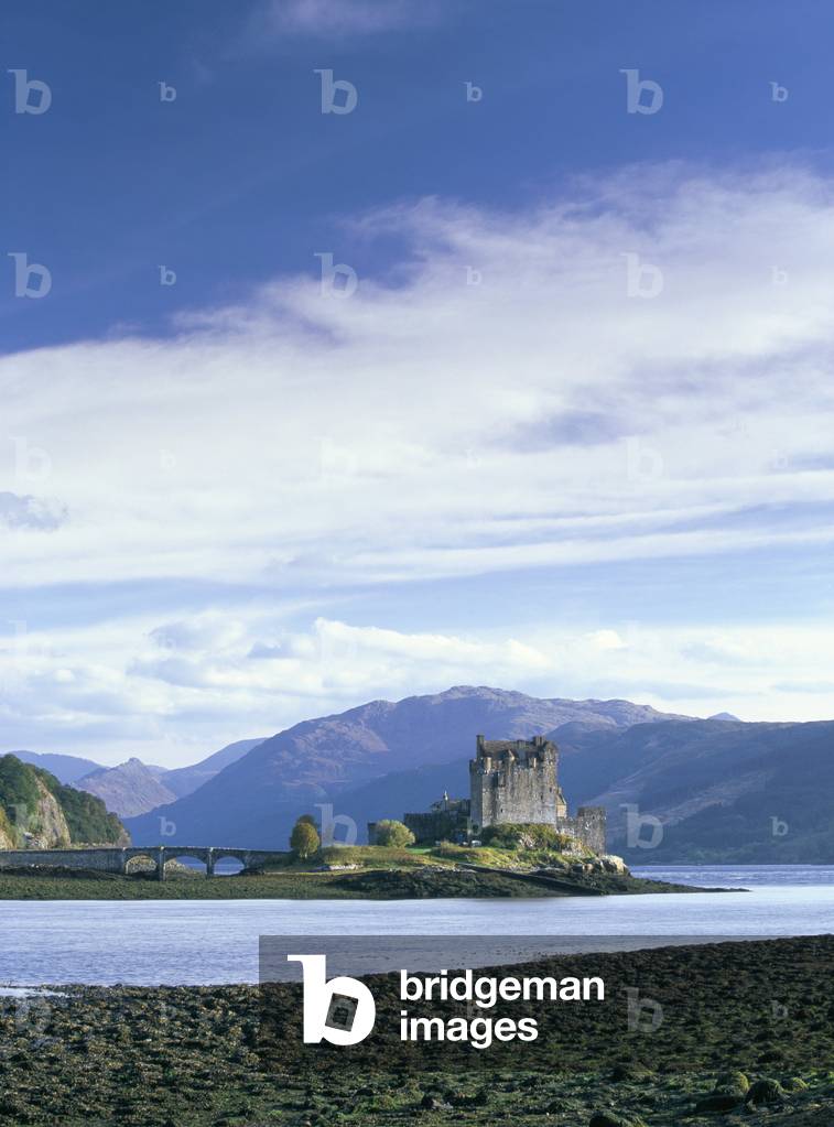 Image of Eilean Donan castle at low tide, MacRae stronghold on small