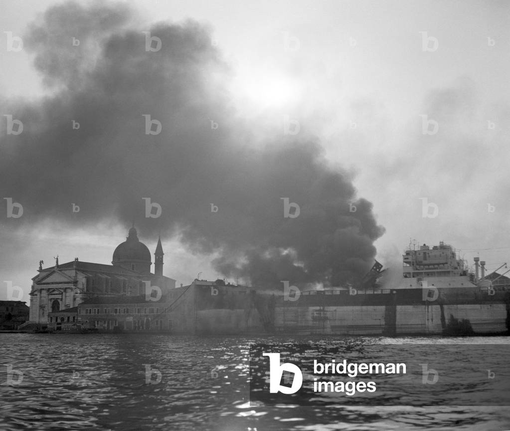 Image of Thick black smoke egressing from the oiler tank Luisa on