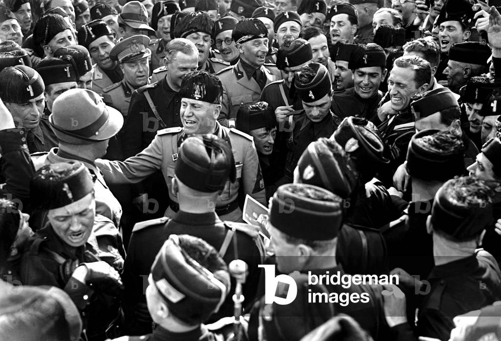 Image of Benito Mussolini surrounded by Turin officers after his speech ...