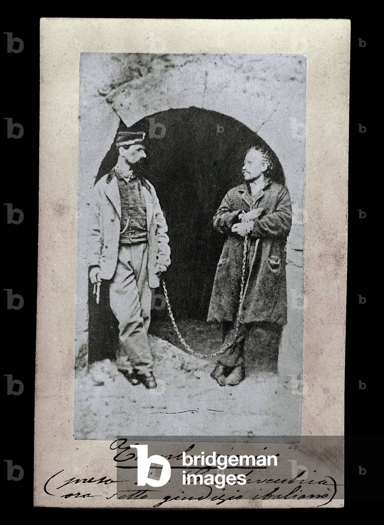 Image of Police photograph of Italian bandit Tamburrini, handcuffed ...