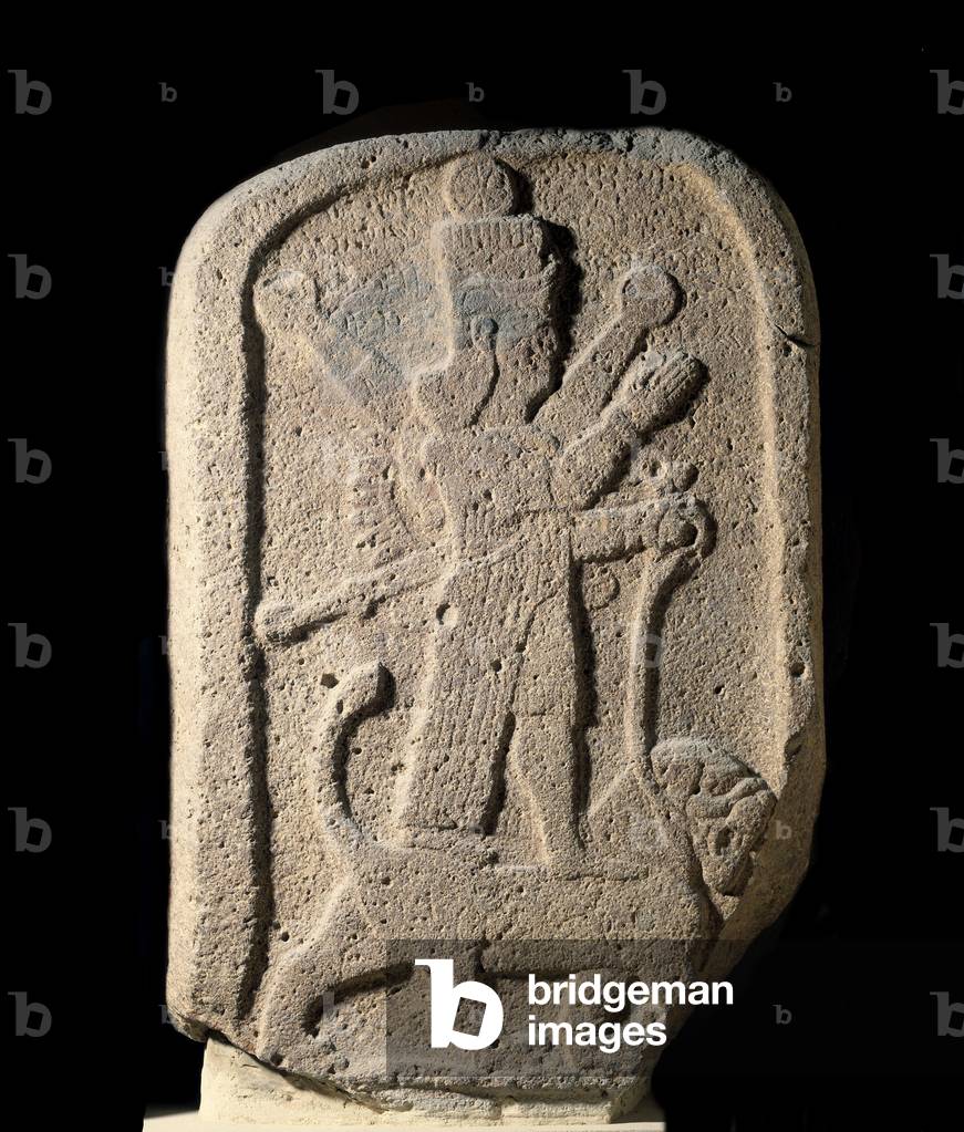 Image of Stele representing the goddess Ishtar of Arbeles holding a ...