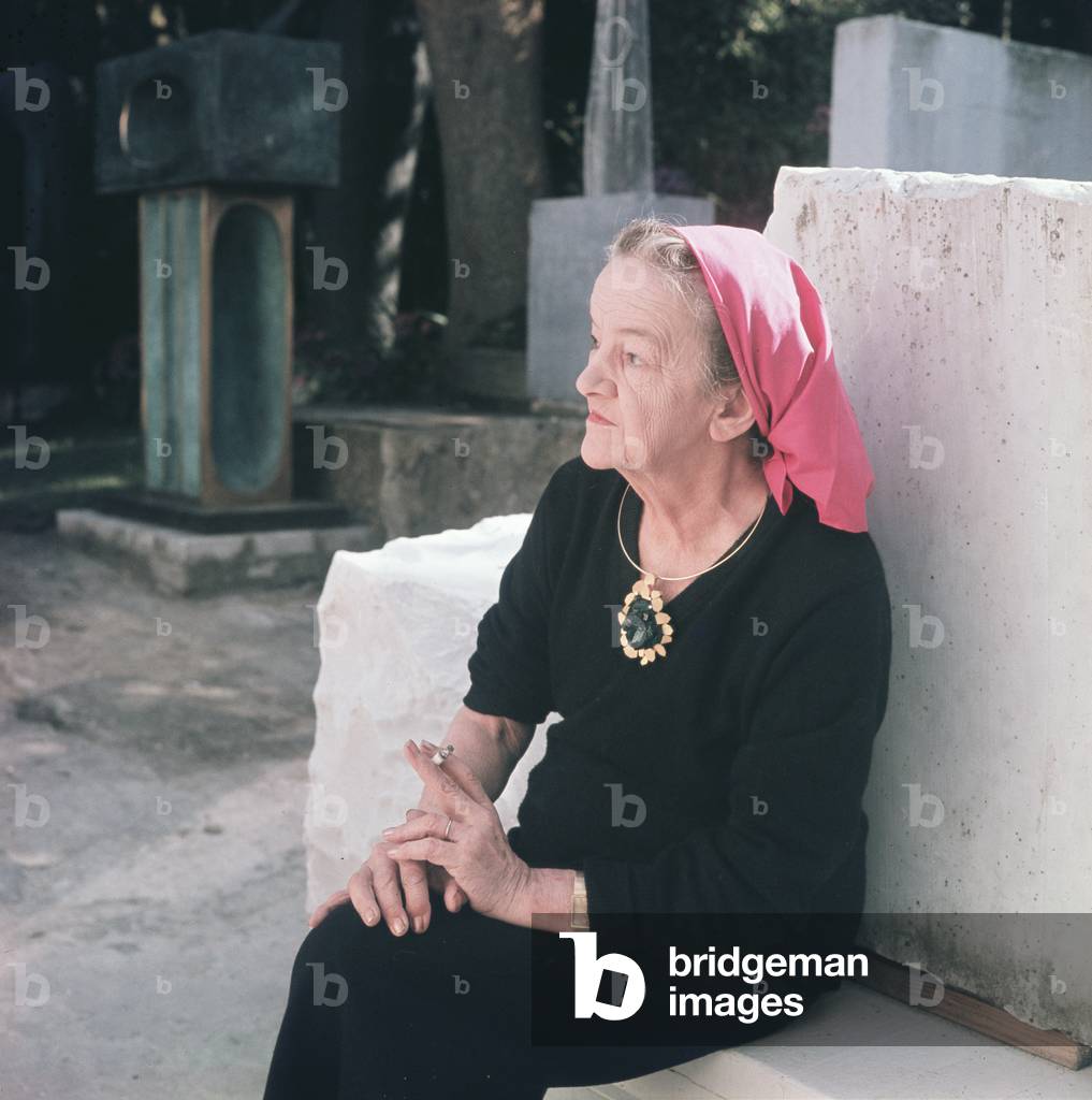 Image of Portrait of Dame Barbara Hepworth (1903-75) seated in her garden