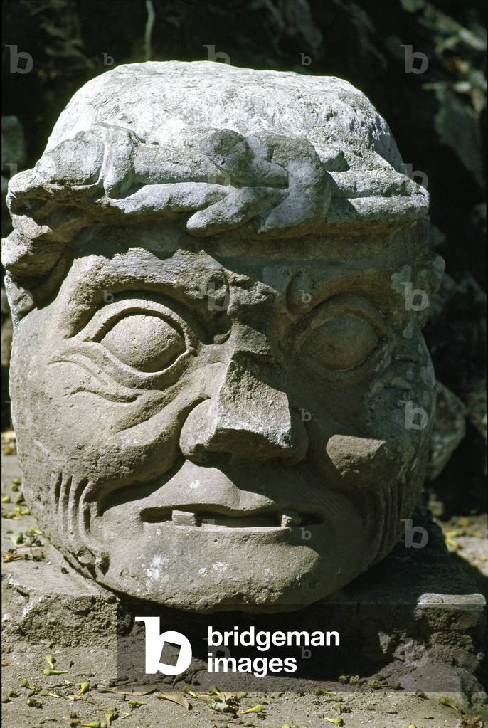 Image of Stone sculpture of a old man head called the old by Mayan ...