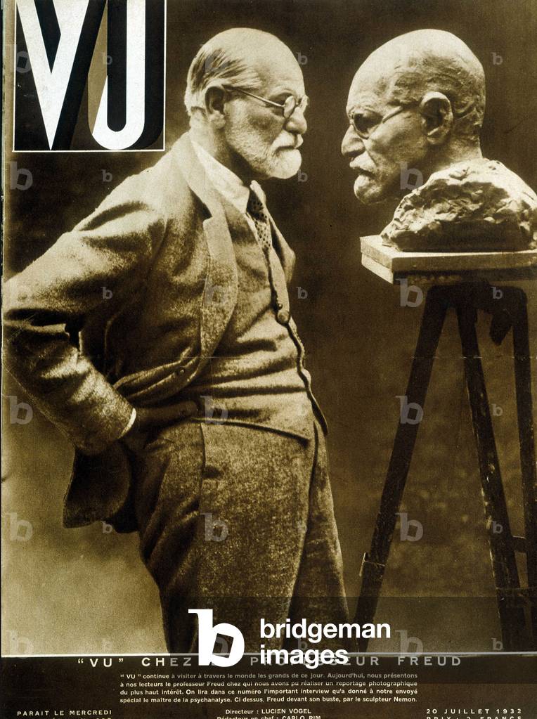 Image of Sigmund Freud looking at his sculpted portrait, 1932 - in by ...