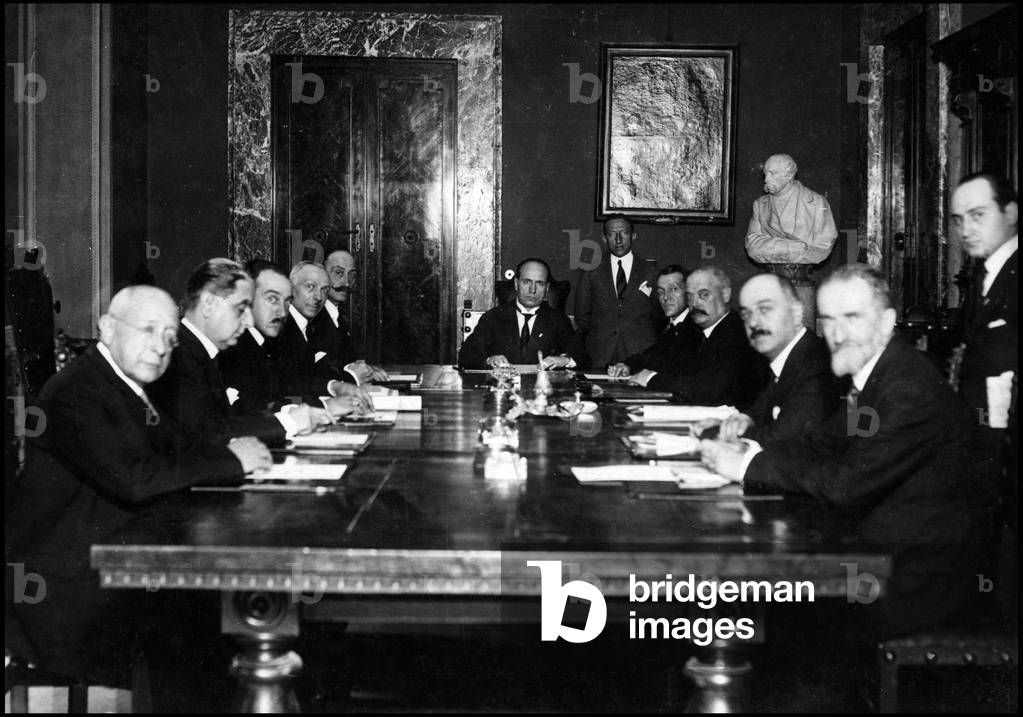 Image of The Italian head of the government Benito Mussolini chairing the