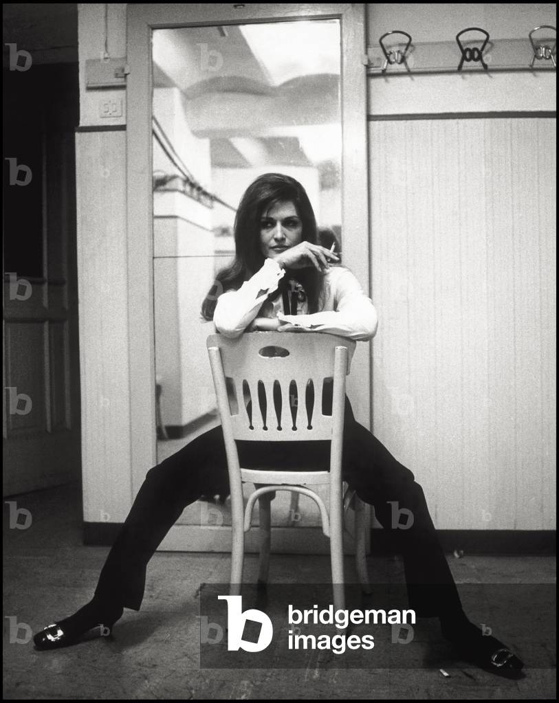 The Italian French singer Dalida posing on a chair at the 17th edition ...