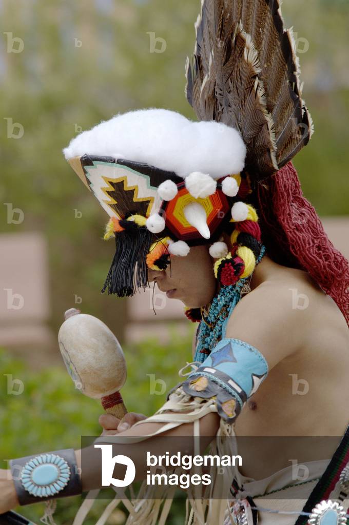 Image of Zuni Red-Tailed Hawk Dancer performing the Turkey Dance at the