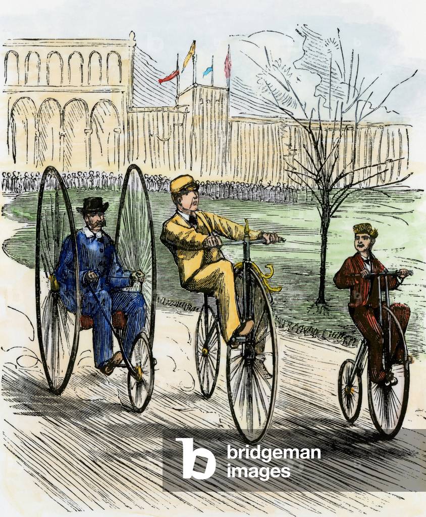 Image of Cyclists on different models of bicycles and tricycles including a