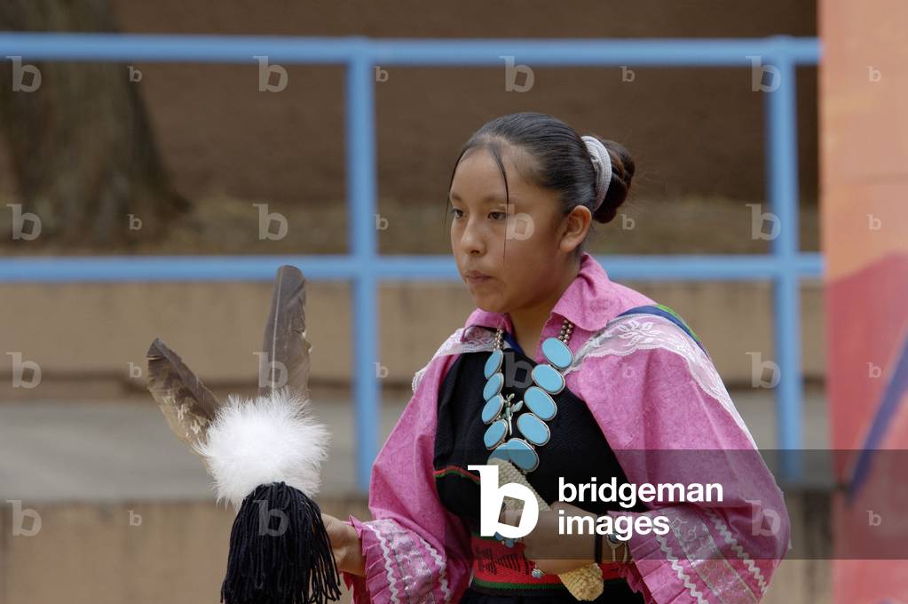 Image of Zuni Pueblo girl performing the Turkey Dance with the Red-Tailed