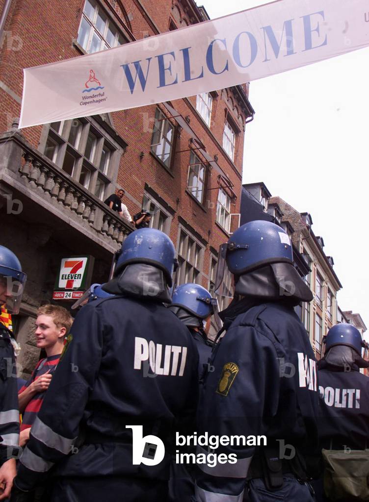 Image of DANISH RIOT POLICE WATCH TURKISH AND BRITISH SOCCER FANS IN