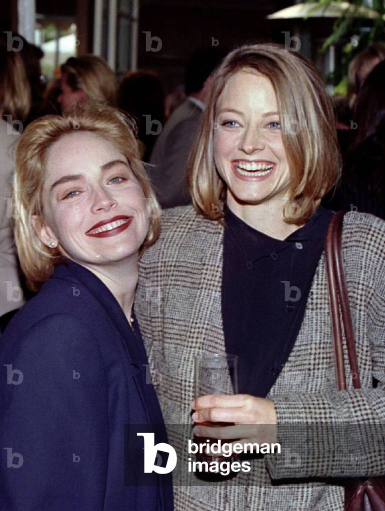Image of Actresses Jodie Foster (R) and Sharon Stone pose together at