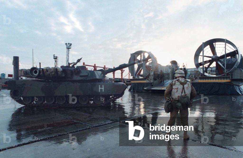 Image of U.S. MARINES LAND M1A1 TANKS IN KUWAIT AT START OF
