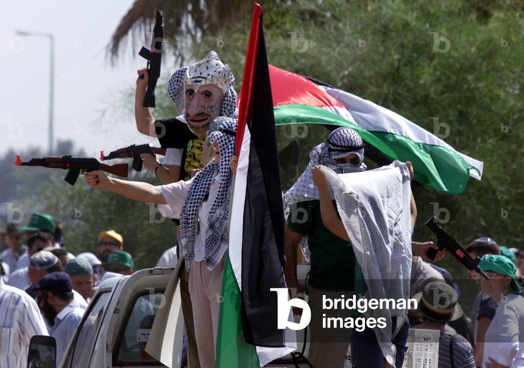 Image of Israeli Jews dressed as Palestinian "terrorists", including ...