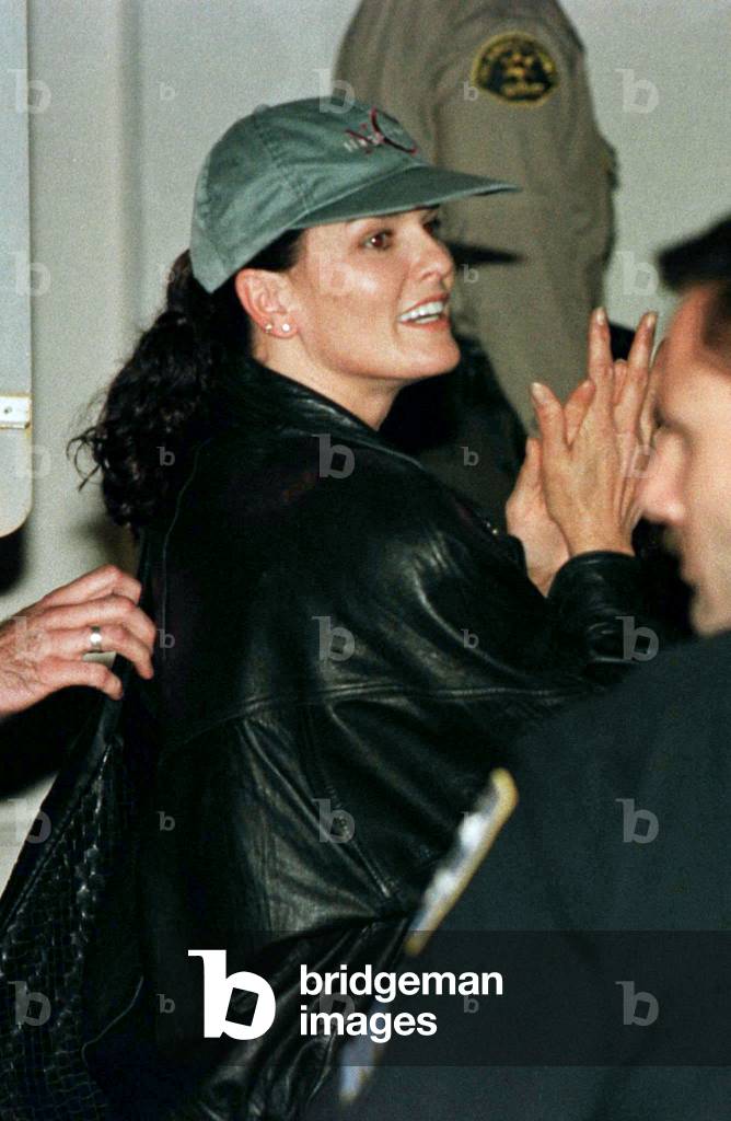 Image of Denise Brown, sister of murder victim Nicole Brown Simpson, leaves