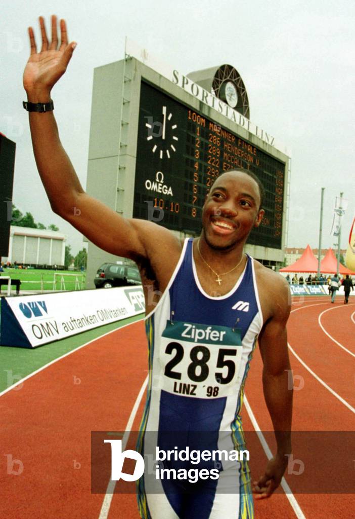 Image of TIM HARDEN OF THE UNITED STATES WINS THE 100 METRES