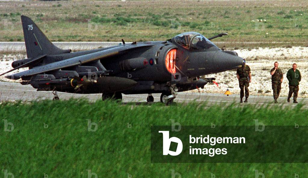 Image of BRITISH RAF ENGINEERS CHECK HARRIER AT GIOIA DEL COLLE AIRBASE
