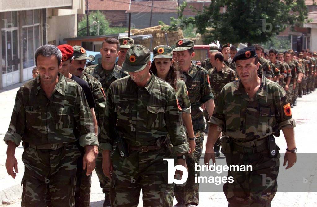 Image of KOSOVO LIBERATION ARMY MARCH THROUGH ORAHOVAC IN KOSOVO, 1999 ...