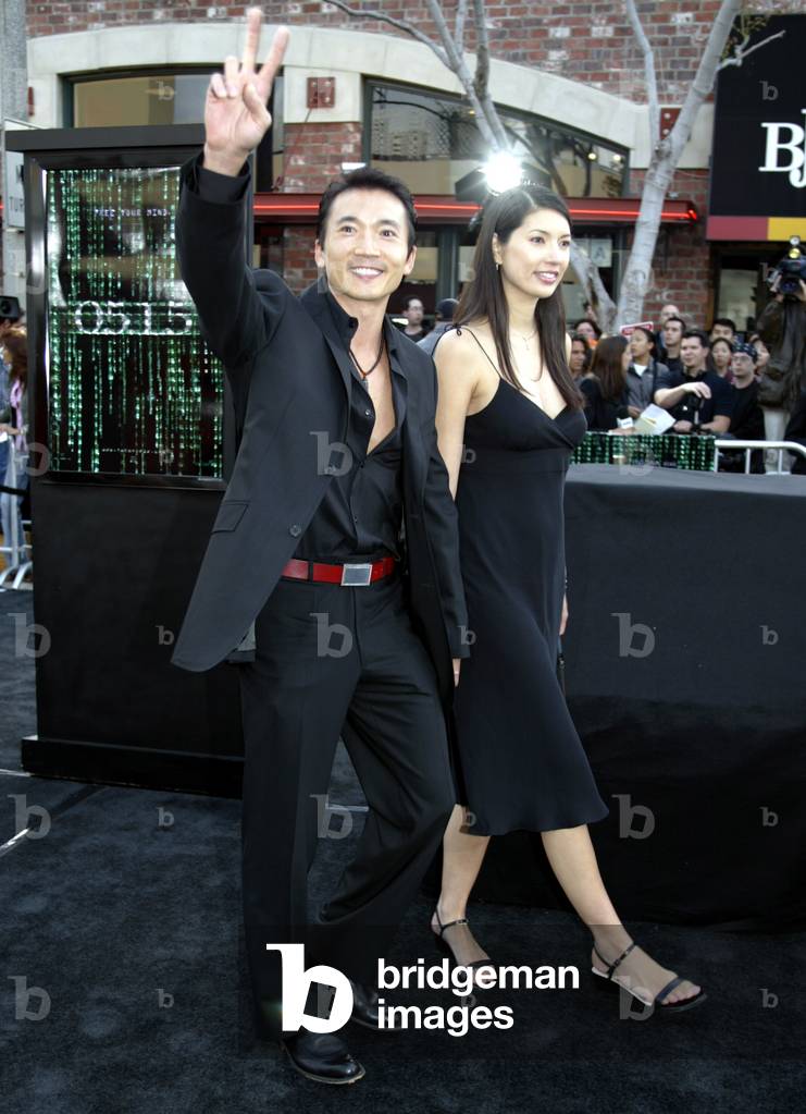 Image of ACTOR CHOU ARRIVES WITH WIFE WANDA YUNG FOR MATRIX RELOADED