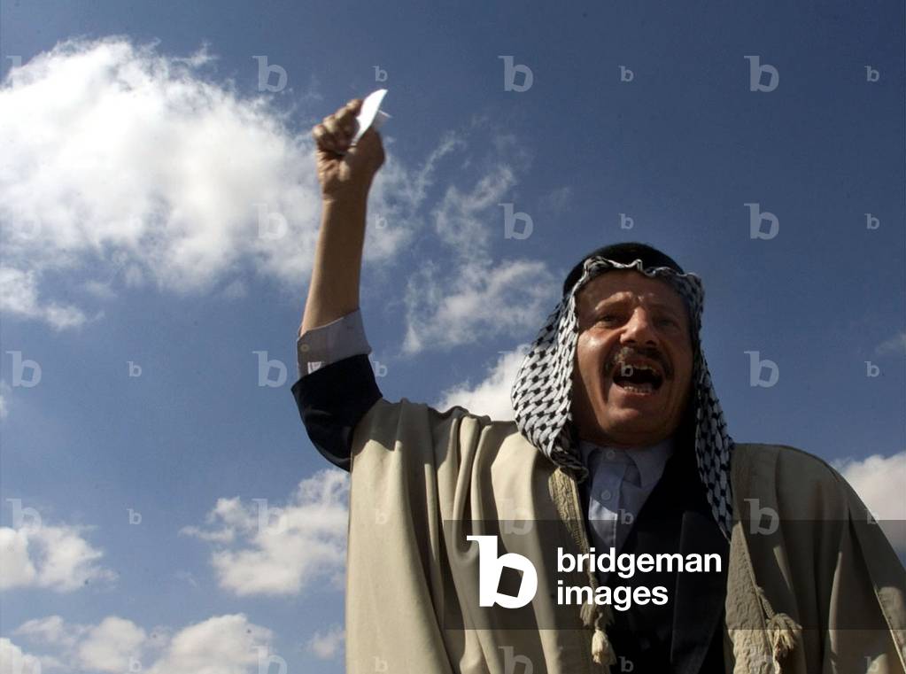 Image of IRAQI SHOUTS SLOGANS AGAINST THE US AND ISRAEL ON THE