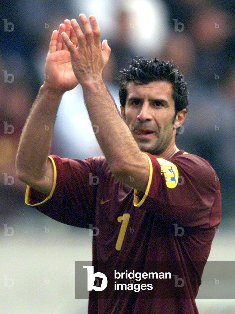Image of PORTUGAL'S LUIS FIGO SALUTES THE CROWD FOLLOWING HIS TEAM'S ...
