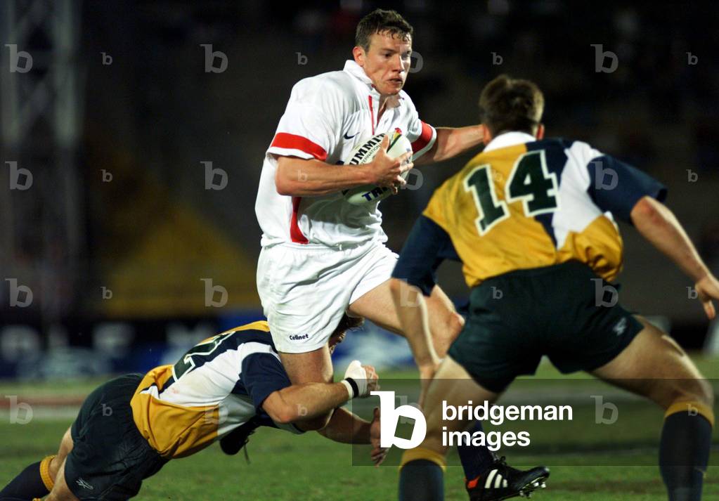 Image of ENGLAND'S TIM STIMPSON IS TACKLED BY WALLABYS TIM HORAN AND