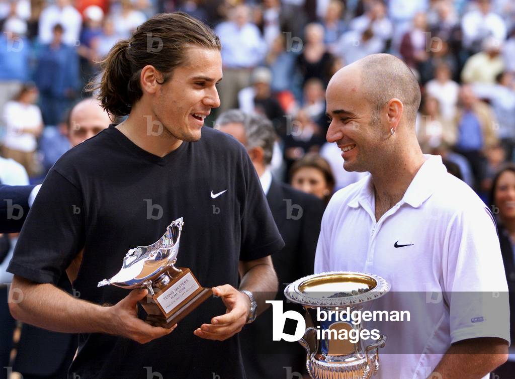 Image of ANDRE AGASSI OF THE U.S. POSES WITH TOMMY HAAS OF