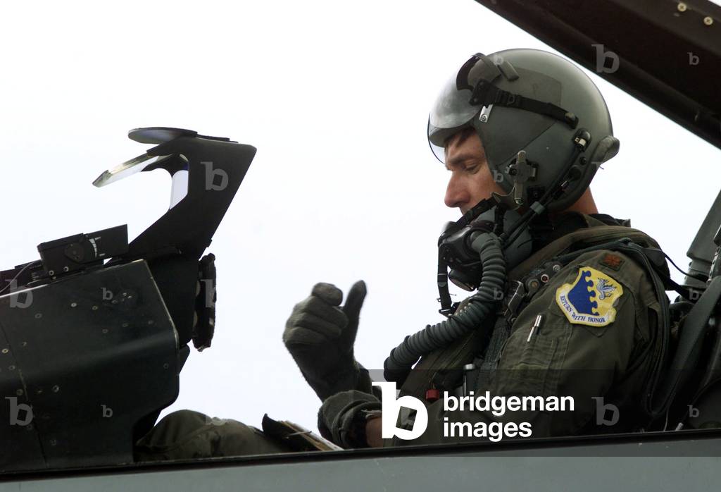 Image of AN F-16 PILOT PREPARES TO TAKE OFF FROM AVIANO AIR