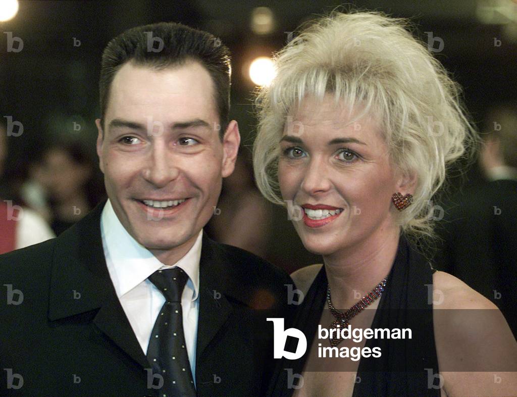 Image of German cyclist Erik Zabel arrives with his wife Cordula at