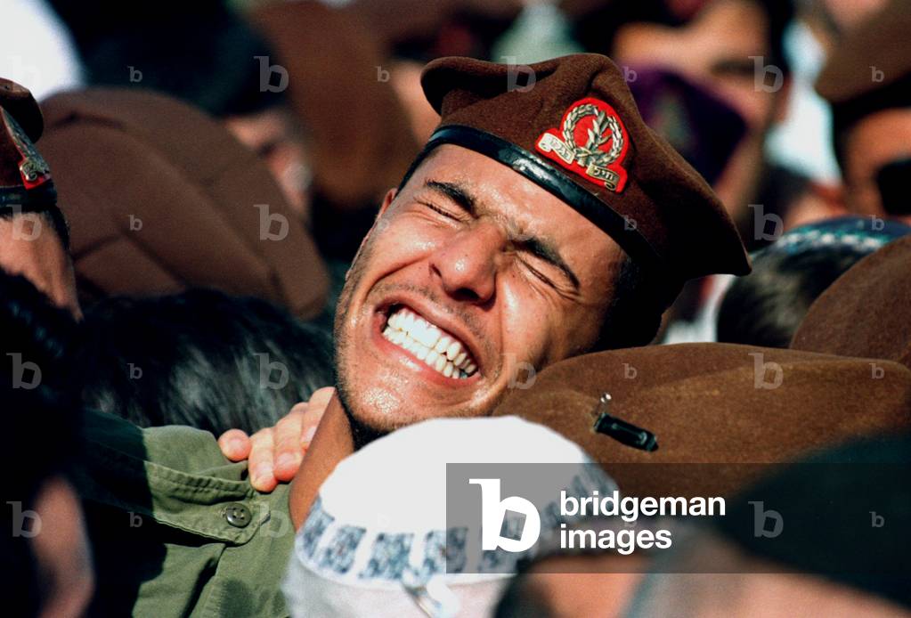 Image of An Israeli infantry soldier from the Golani Brigades screams out