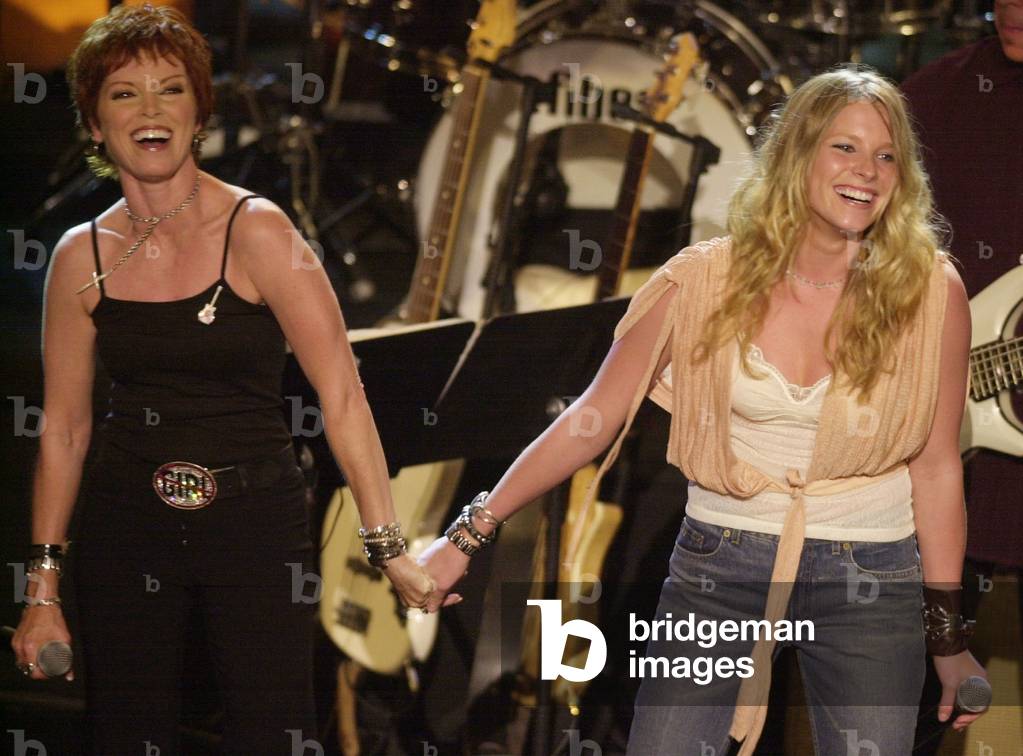 Image of PAT BENATAR AND SHEA SEGER PERFORM "WE BELONG" AT WOMEN