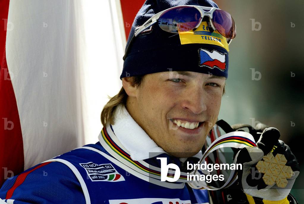 Image of CZECH'S KOUKAL SHOWS OFF HIS GOLD MEDAL IN THE MEN'S