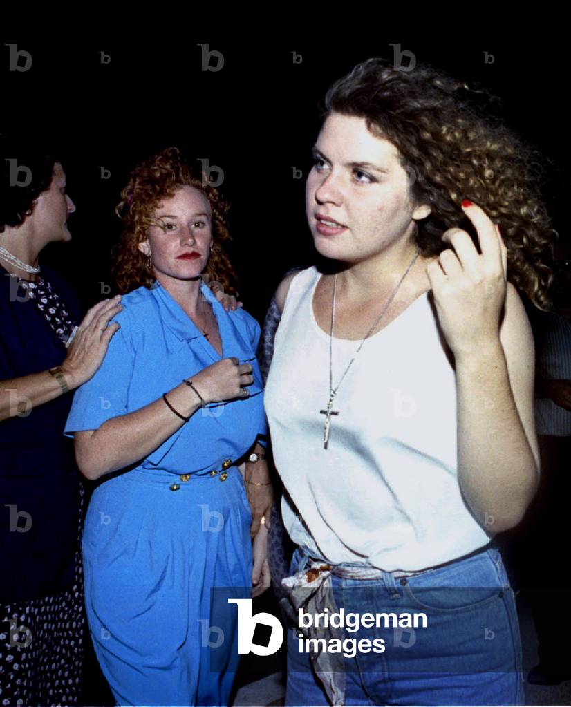 Image of British women Karyn Smith (C) and Patricia Cahill (R) arrive