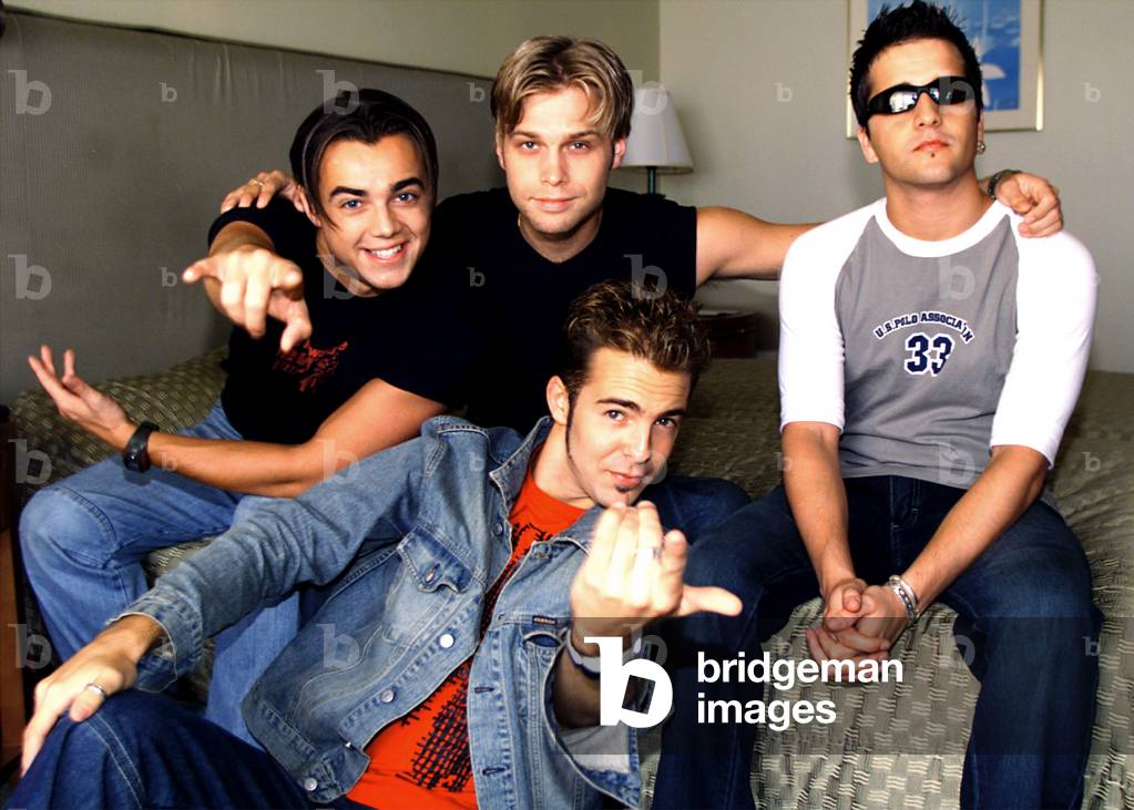 Image of MEMBERS OF THE BRITISH BOY BAND A1 POSE FOR PHOTOGRAPHERS