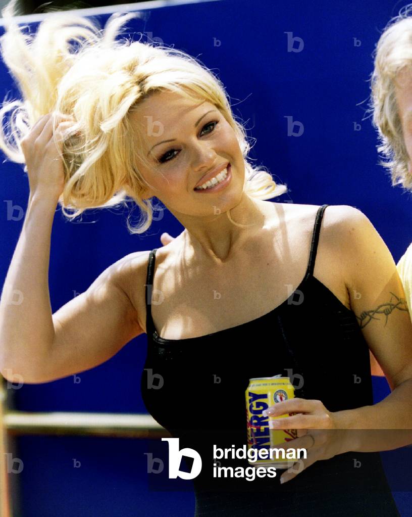 Image of Baywatch star Pamela Anderson poses with the Virgin Group's new