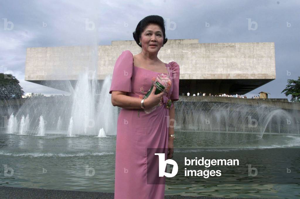 Image of FORMER PHILIPPINE FIRST LADY IMELDA MARCOS POSES IN FRONT OF