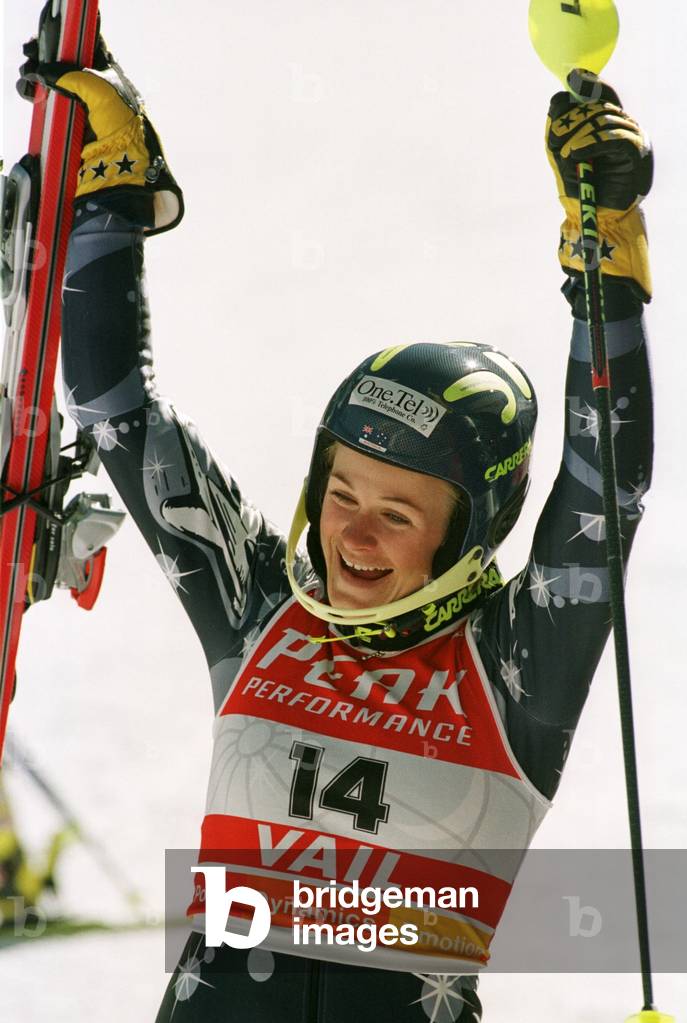 Image of STEGGALL OF AUSTRALIA LIFTS HER ARMS IN CELEBRATION AFTER WIN,