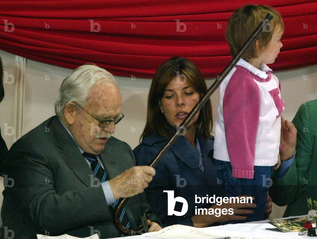 Image of Princess Caroline of Monaco (second R) sits with her father