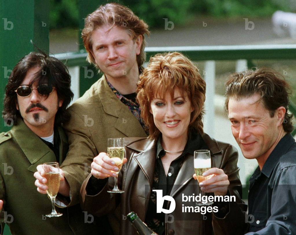 Image of Katrina Leskanich (C) of Katrina and the waves poses with