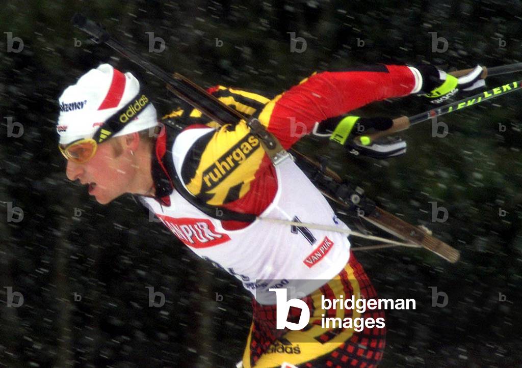 Image of TOMASZ SIKORA OF POLAND RUNS DURING MEN'S 12.5 KM PURSUIT