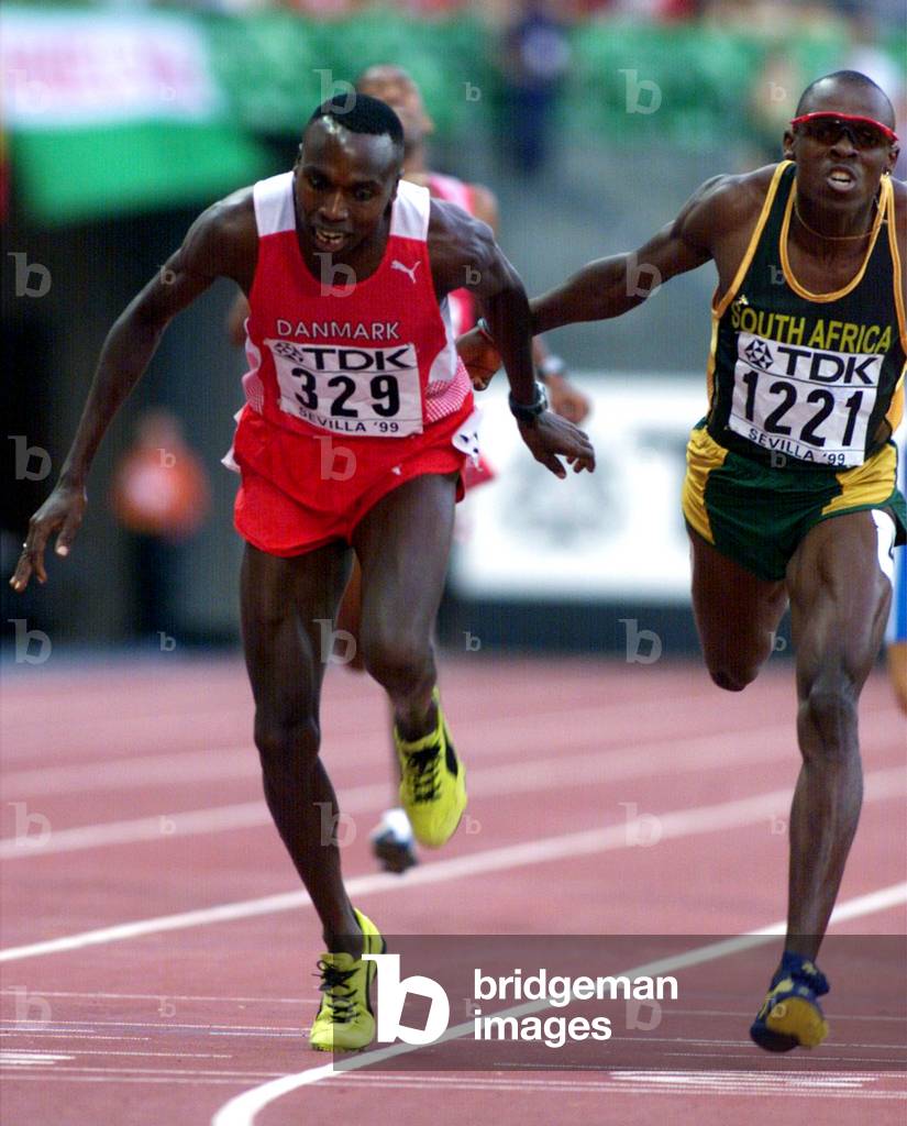 Image of DANISH WILSON KIPKETER CROSSES THE FINISH LINE AHEAD OF SOUTH