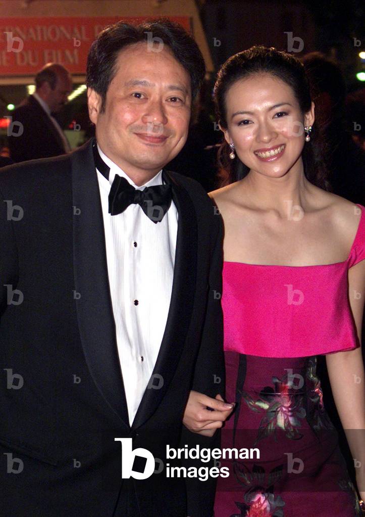 Image of Chinese director Ang Lee and wife Jane Lin pose after