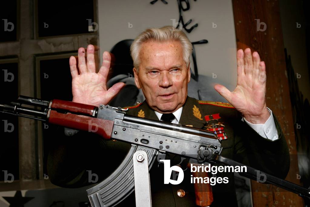 Image of RUSSIAN GENERAL KALASHNIKOV TAKES HIS HANDS OFF A KALASHNIKOV ...