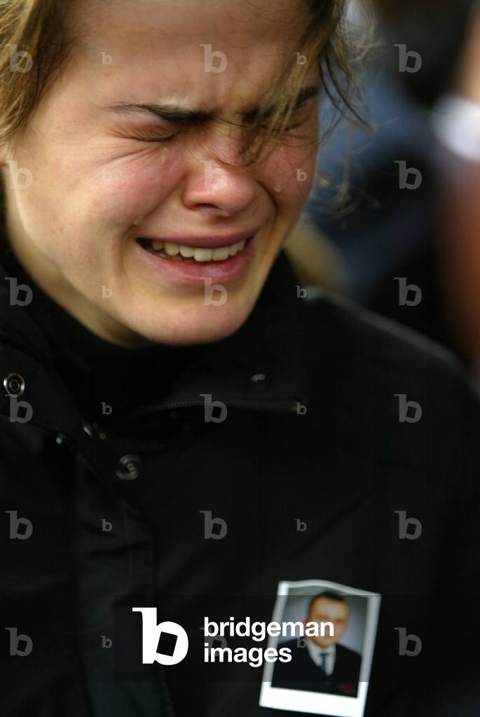 Image of A WOMAN CRIES IN THE MOSQUE WHILE ATTENDING FUNERAL CEREMONY