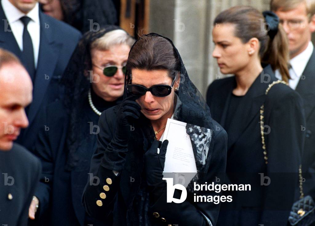 Image of Princess Caroline of Monaco (C) weeps as she leaves the