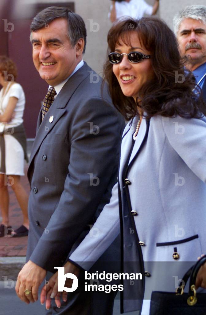 Image of Quebec Premier Lucien Bouchard and his wife Audrey Best leave