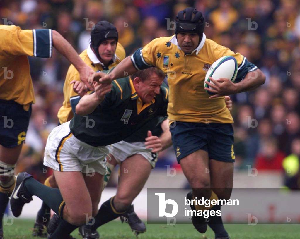 Image of Australia's Matt Cockbain (R) makes a break through Australia ...